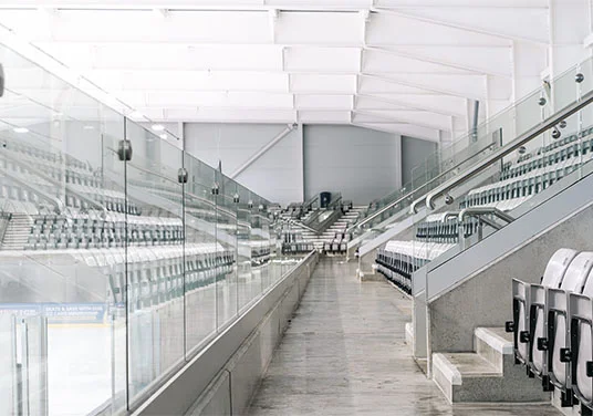 Frameless glass balustrade for stadium arena