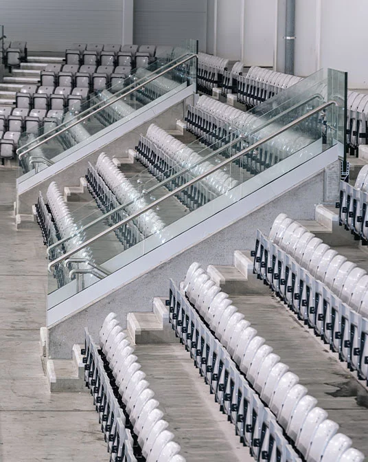Frameless glass balustrade for stadium arena